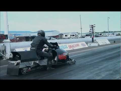 Asphalt Sled Drag Racing Video - Snowmobile Racing a Mustang on Asphalt