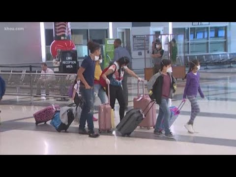 International travelers arrive at Bush Intercontinental Airport