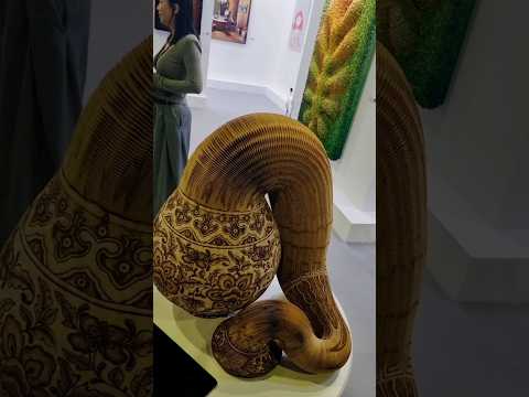 Guess What This Art Paper at World Art Dubai 2025: Folded Snake or Vase?