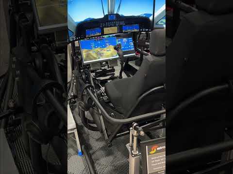 Simcraft Apex in Flight - Flight Motion Simulator shown with fixed and rotary wing controls at CEDIA