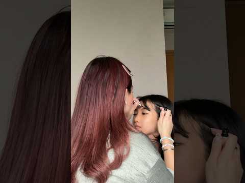 doing my little sister makeup for school
