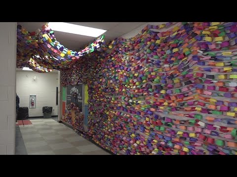Students inspired to honor Holocaust victims with paper chain display