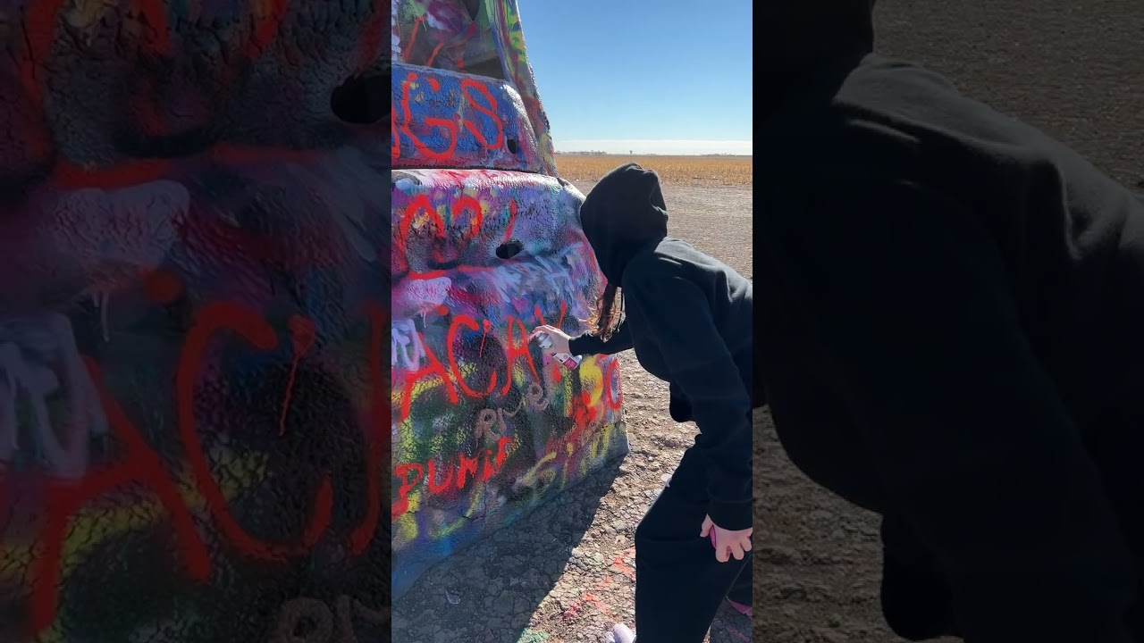 Spray Painting Cadillacs at Cadillac Ranch in Amarillo, Texas