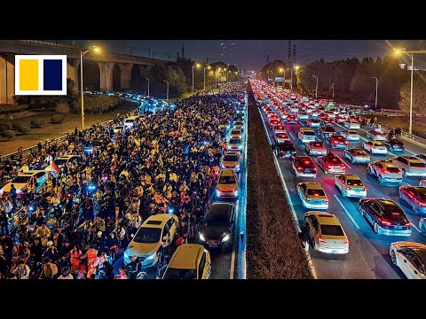 Chinese cycling craze involving 200,000 students blocks ancient city ...