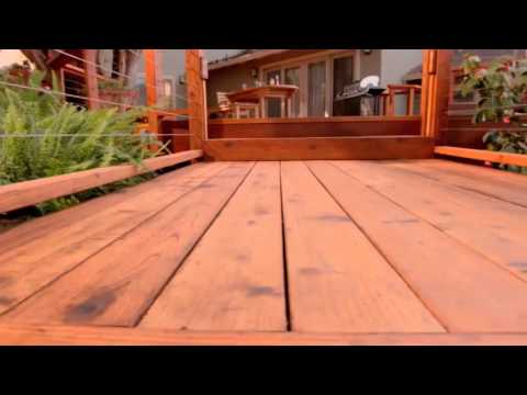 Real Redwood Decking vs Plastic Decking
