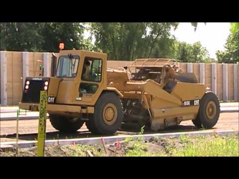 Cat 613C Scraper Working