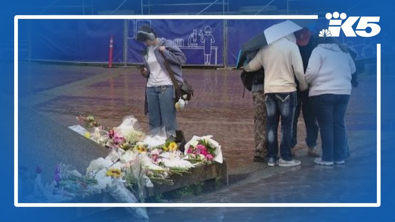 Suspect surrenders as UW campus mourns