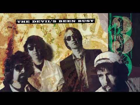The Traveling Wilburys - The Devil's Been Busy (Official Visualizer)
