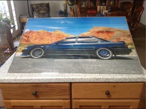 DIY FREE 24x36' poster from ShutterFly or other 4x6' prints photo printing services.