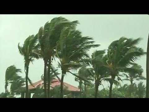 Cyclone Hudhud loses speed as it crosses Andhra Pradesh