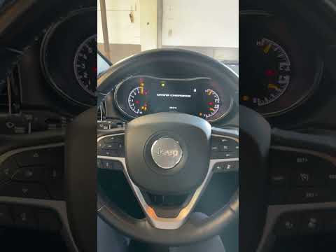 2021 Jeep Grand Cherokee start up sequence - hear the door close and engine start as well as dash