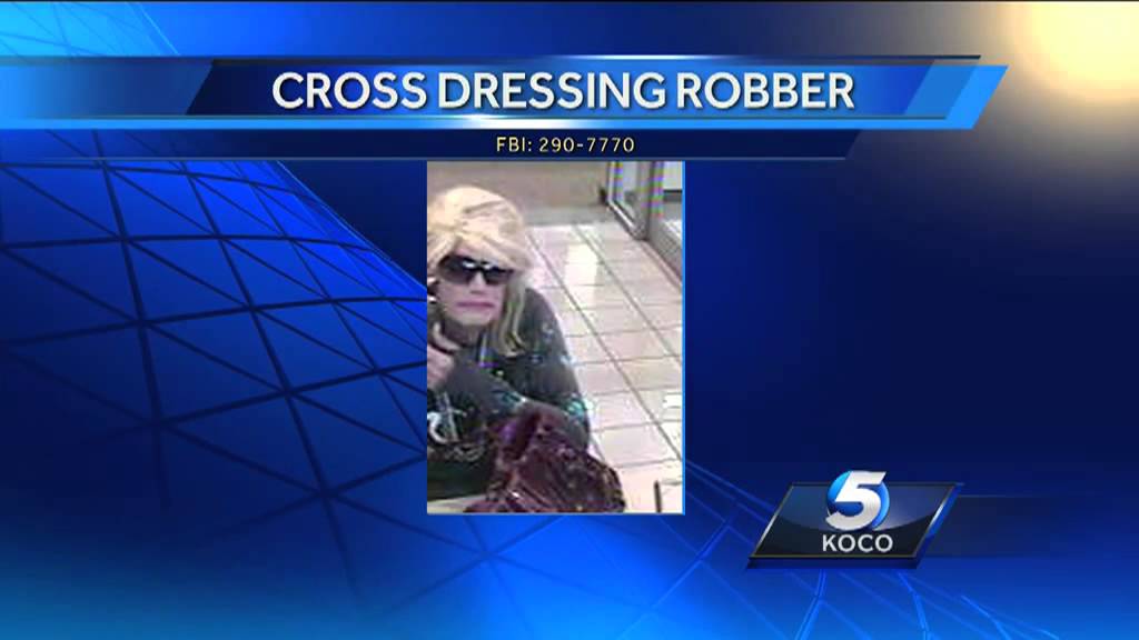 Authorities say man dressed as woman robs bank