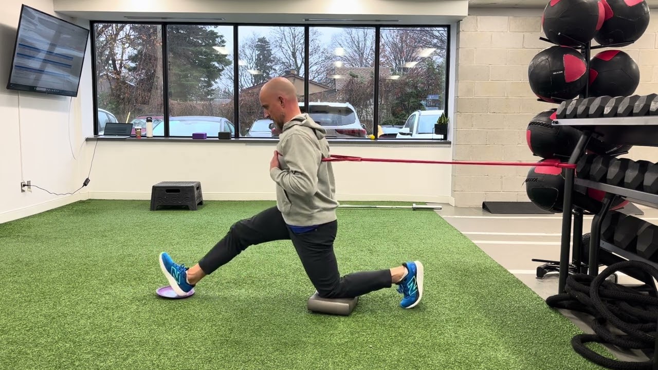 Half kneeling hamstring slide out, assisted 