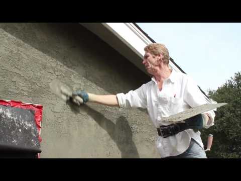 Apply a skip trowel texture with base coat stucco.