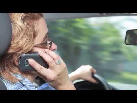Can I use my cell phone while driving in Nevada?
