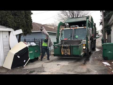 Waste Management Carry Can Garbage Trucks In Berwyn