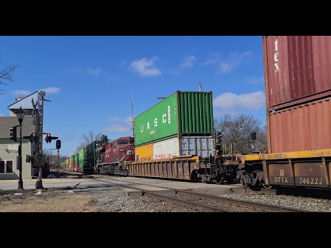 CP 199 Intermodal with CP 8104 GE AC44CWM & CP 8800 GE ES44AC mid DPU through Elm Grove, WI 3-9-2022