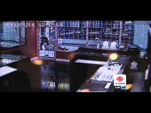 Surveilance footage of jewellery store robbery in Surrey