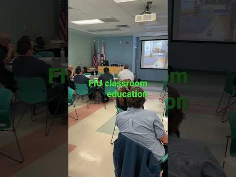 Floor care tech learning before skills training at FIU Miami.