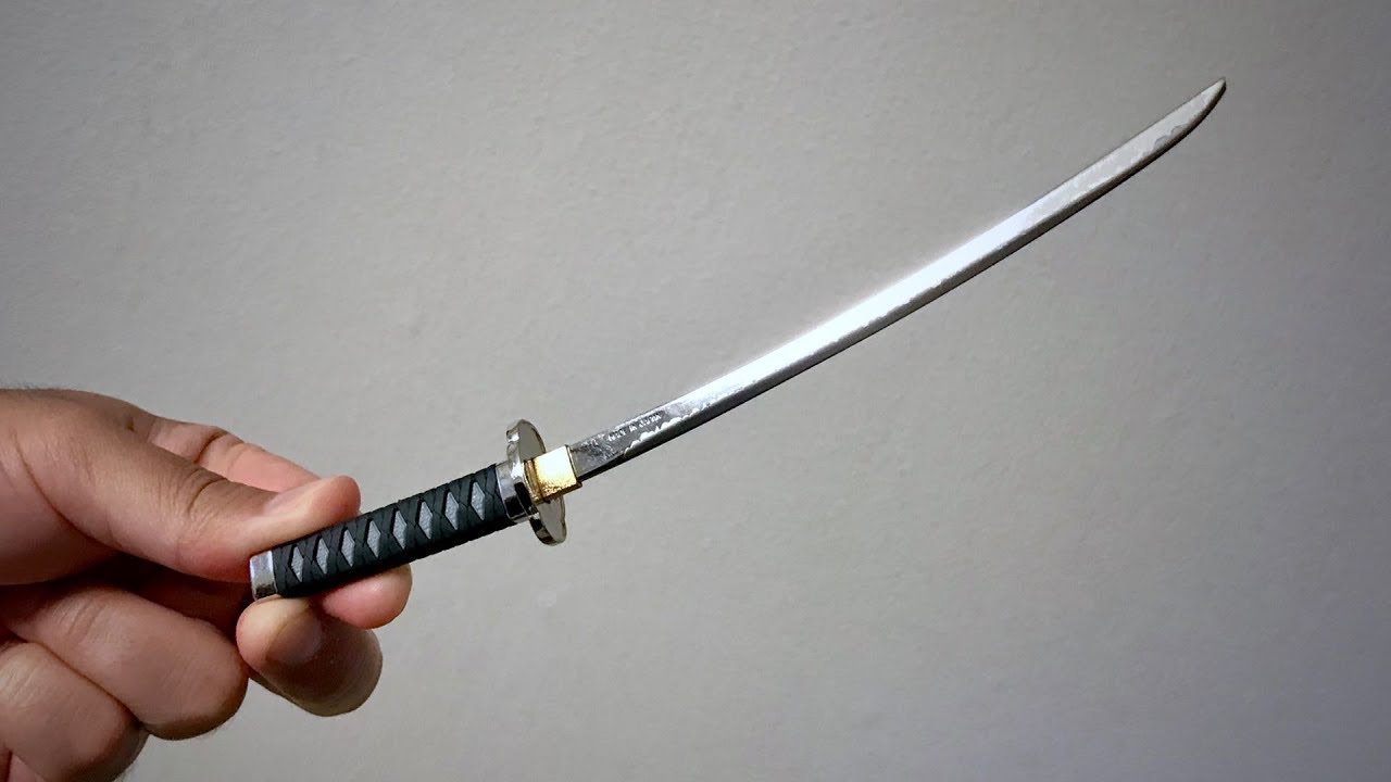 a tiny SAMURAI SWORD... but, for what?