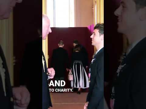 Tom Daley receives OBE medal from the royal family