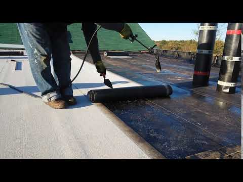 Torch down SBS roofing system.