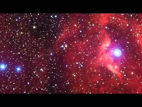 Nebula Glows 'Red' From Hot Young Stars Heat | Video