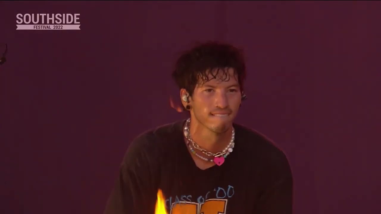 Twenty One Pilots performing Home by Edward Sharpe & I Can See Clearly Now by Jimmy Cliff