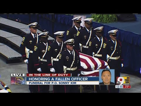 Cincinnati Police Officer Sonny Kim's casket leaves funeral