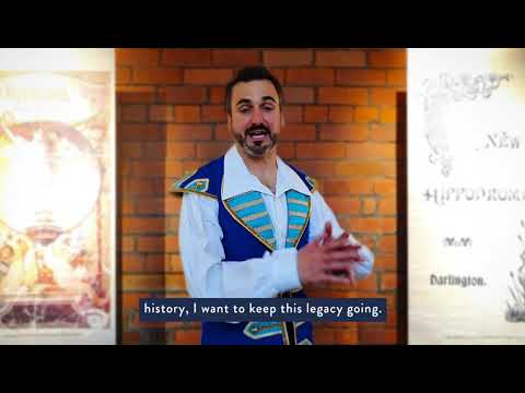Buttons explains the history of panto