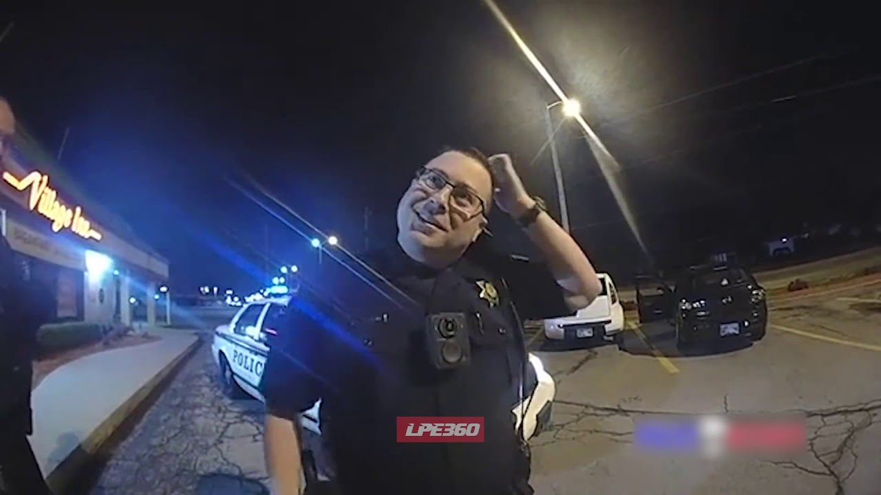 Handcuffed woman steals police car