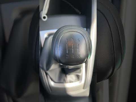What the 2024 Nissan Versa S Manual Transmission stick shift looks like.