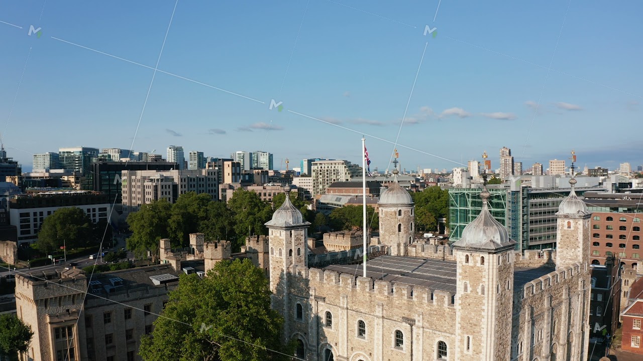 Panorama curve footage of top of White Tower and surrounding buildings. Historic medieval part of