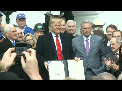President Donald Trump signs USMCA trade agreement | AFP