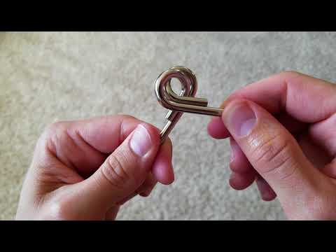 Brain teaser solved. How to solve metal brain teaser. Step by step solution Separate two metal wires