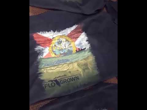 Swimming Gator tees coming down the dryer