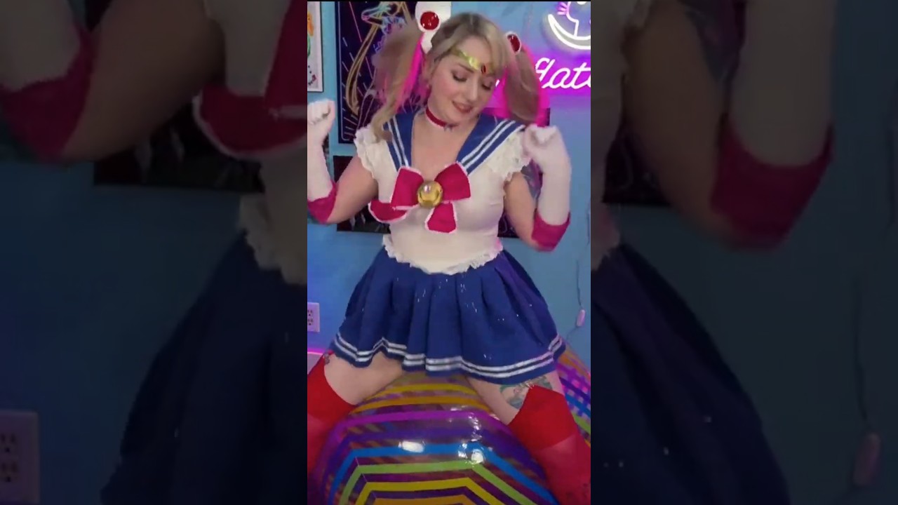 Sailor Moon having fun bouncing on her beach ball