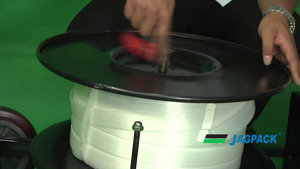 Dispenser for PET/composite polyster strapping