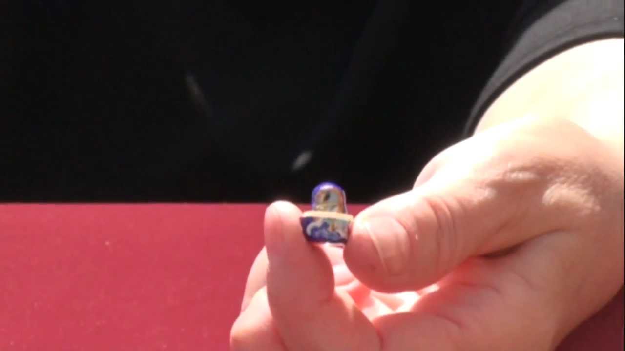How to open Russian tiny nesting dolls