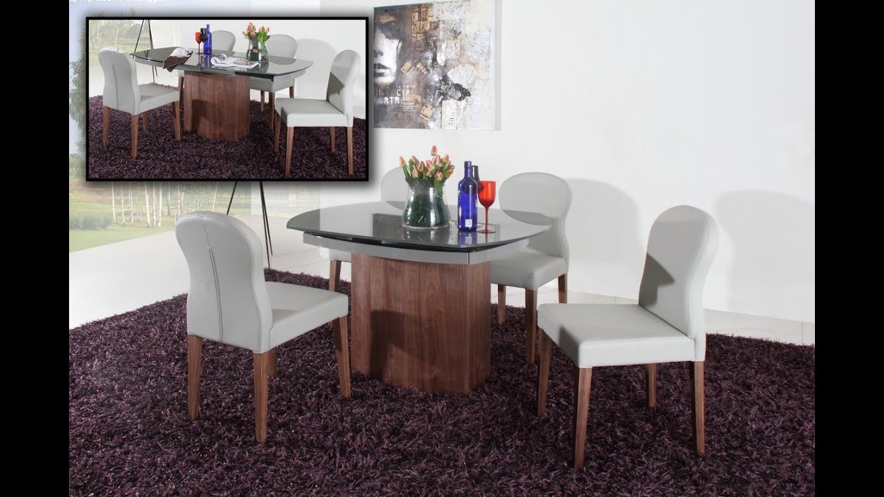 Swing Modern Round Extendable Walnut Dining Table