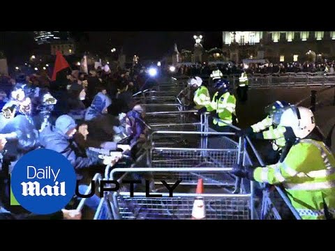 Million Mask March protesters target Buckingham Palace - Daily Mail