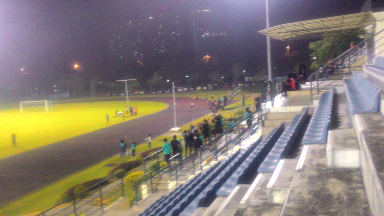 100m Dash at Stadium Under Moonlight