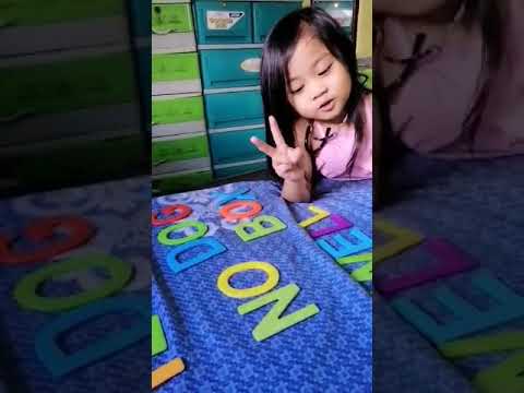 Niah reading 3 letter words.