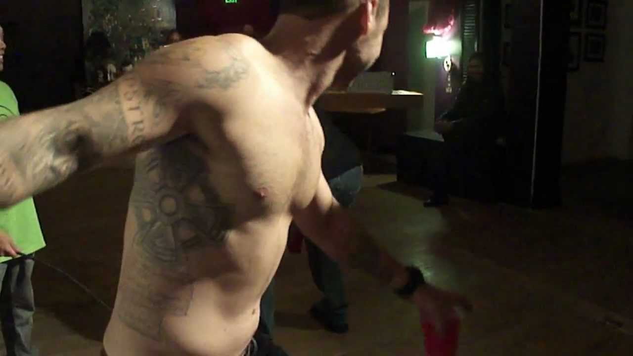 Shirtless Man spanking and being spanked