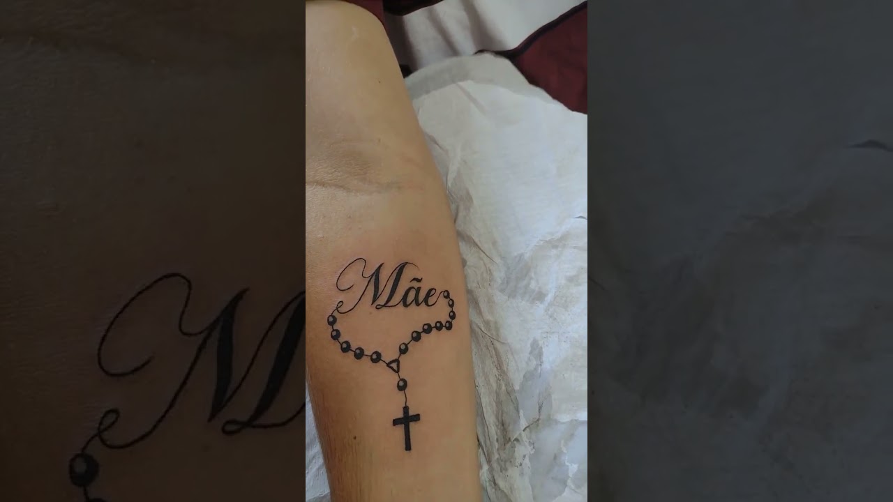 tatuagem nome mãe com terço no braço @MizaelNeubert