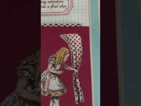 We look at a handmade Alice in Wonderland book while i recite a poem with words that rhyme w June