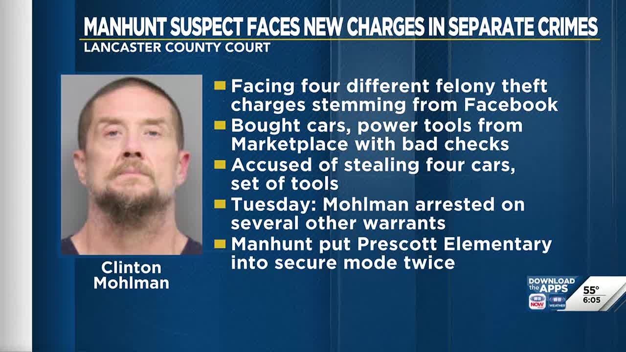 Manhunt suspect faces new charges in separate crimes