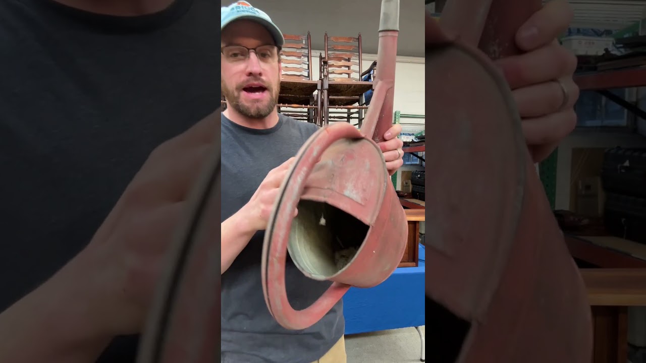 Vintage watering can in our current Discovery Auction