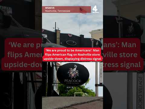 Man flips American flag on Nashville store upside-down, displaying distress signal