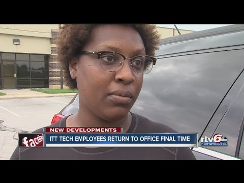 ITT Tech employees collect things from closing school